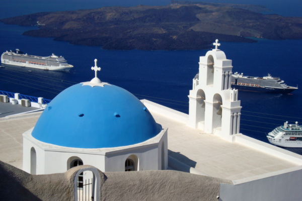 Where to find the famous blue domes of Santorini? - Charisma Suites ...